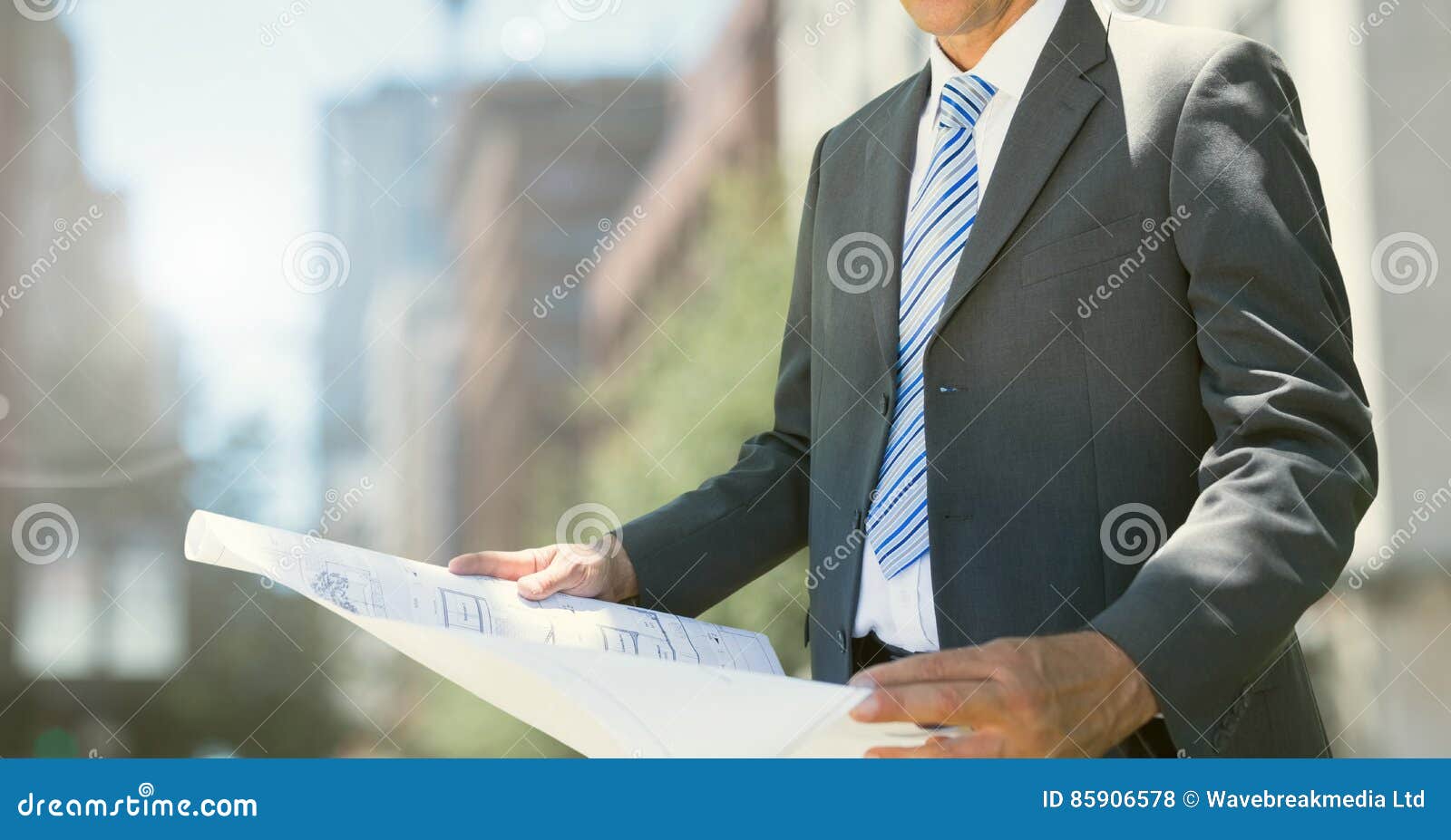 Architect Torso Holding Plans in the Street Stock Photo - Image of ... Architect Torso Holding Plans in the Street Stock Photo - Image of ...