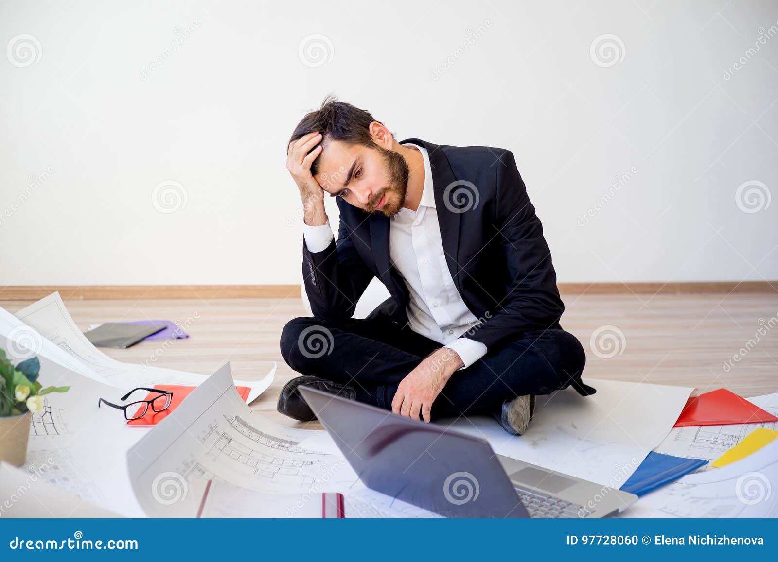 Architect is under stress stock photo. Image of blueprint - 97728060