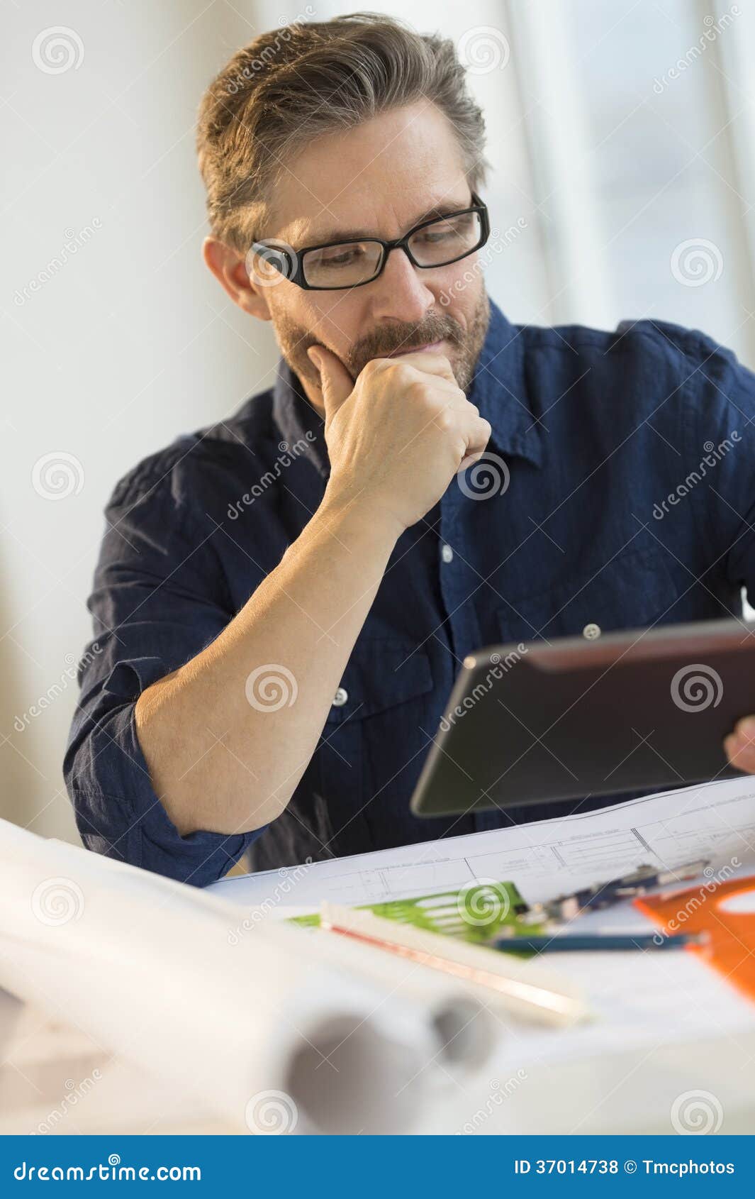 Architect Using Digital Tablet at Desk Stock Photo - Image of engineer ...