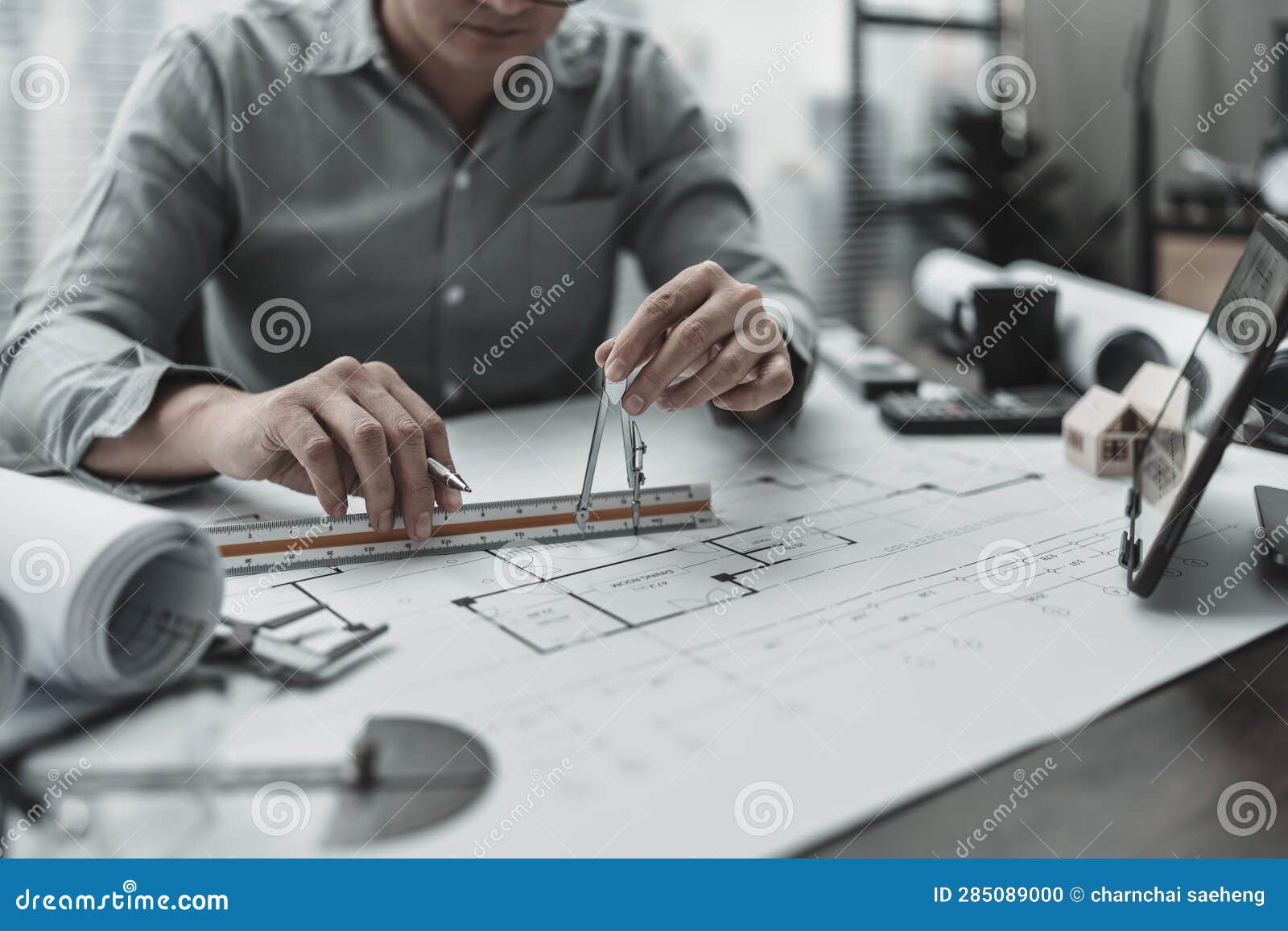 Architect Using Divider Compass Working on Blueprint. House Planning ...