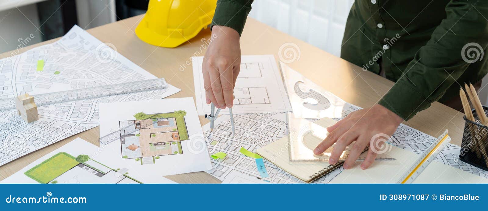 Architect Using Divider To Measure Blueprint. Focus on Hand ...