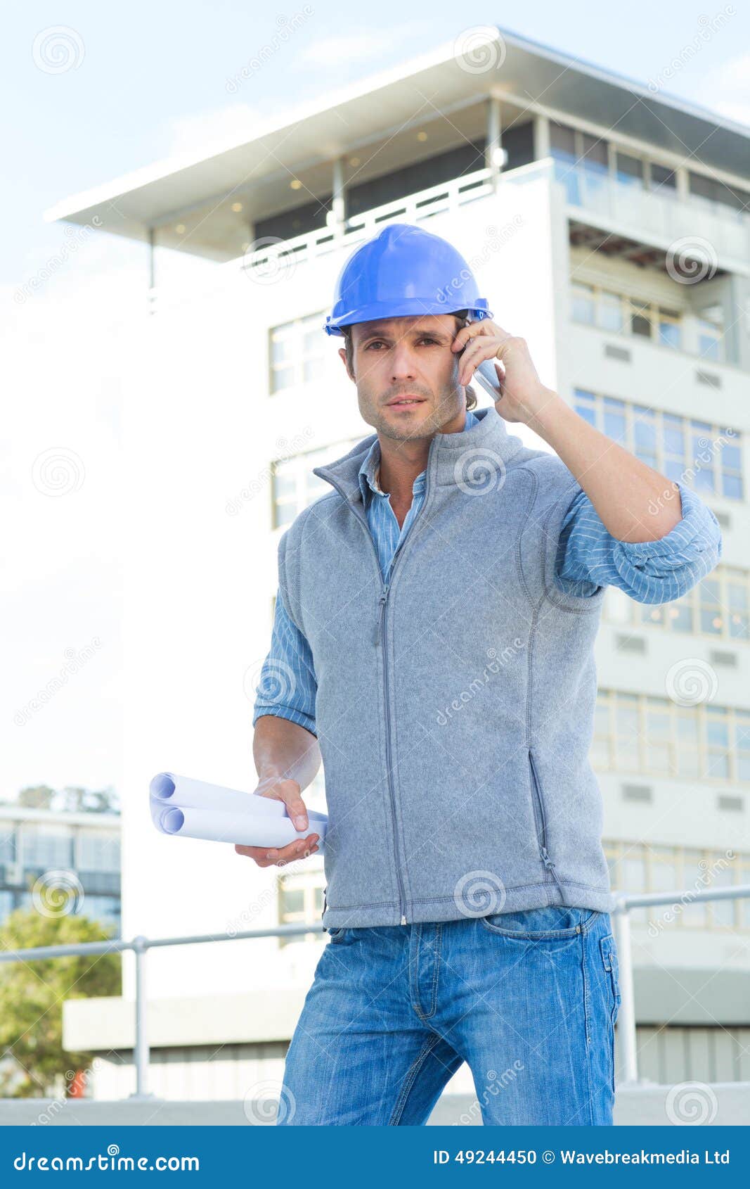Architect Using Mobile Phone Outside Building Stock Photo - Image of ...