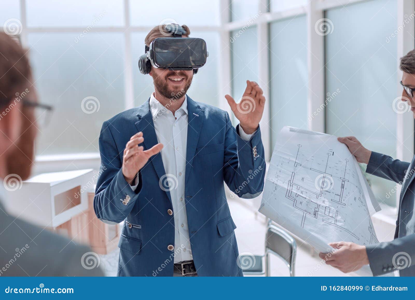Architect Using Virtual Reality Glasses in the Workplace. Stock Image ...