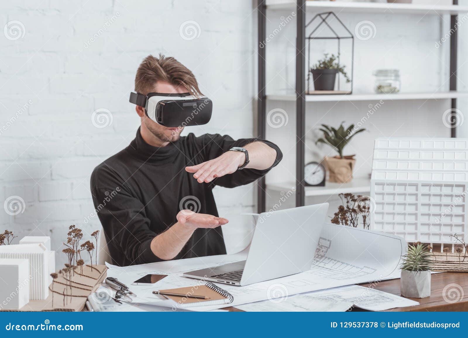 Architect in Vr Headset at Workplace with Laptop Schemes and Building ...