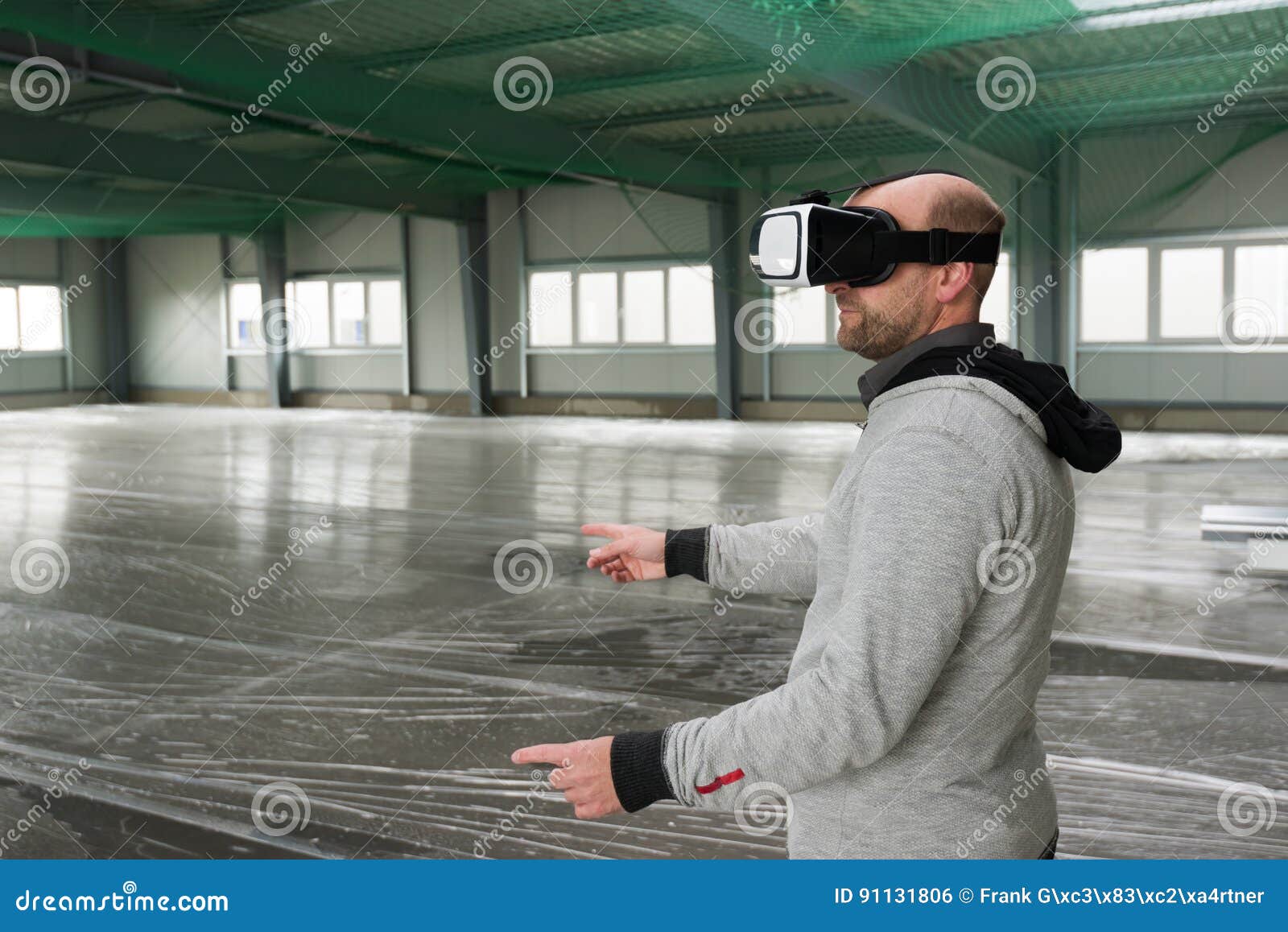 Architect with VR Visor Exploring Industrial Building Environment Stock ...