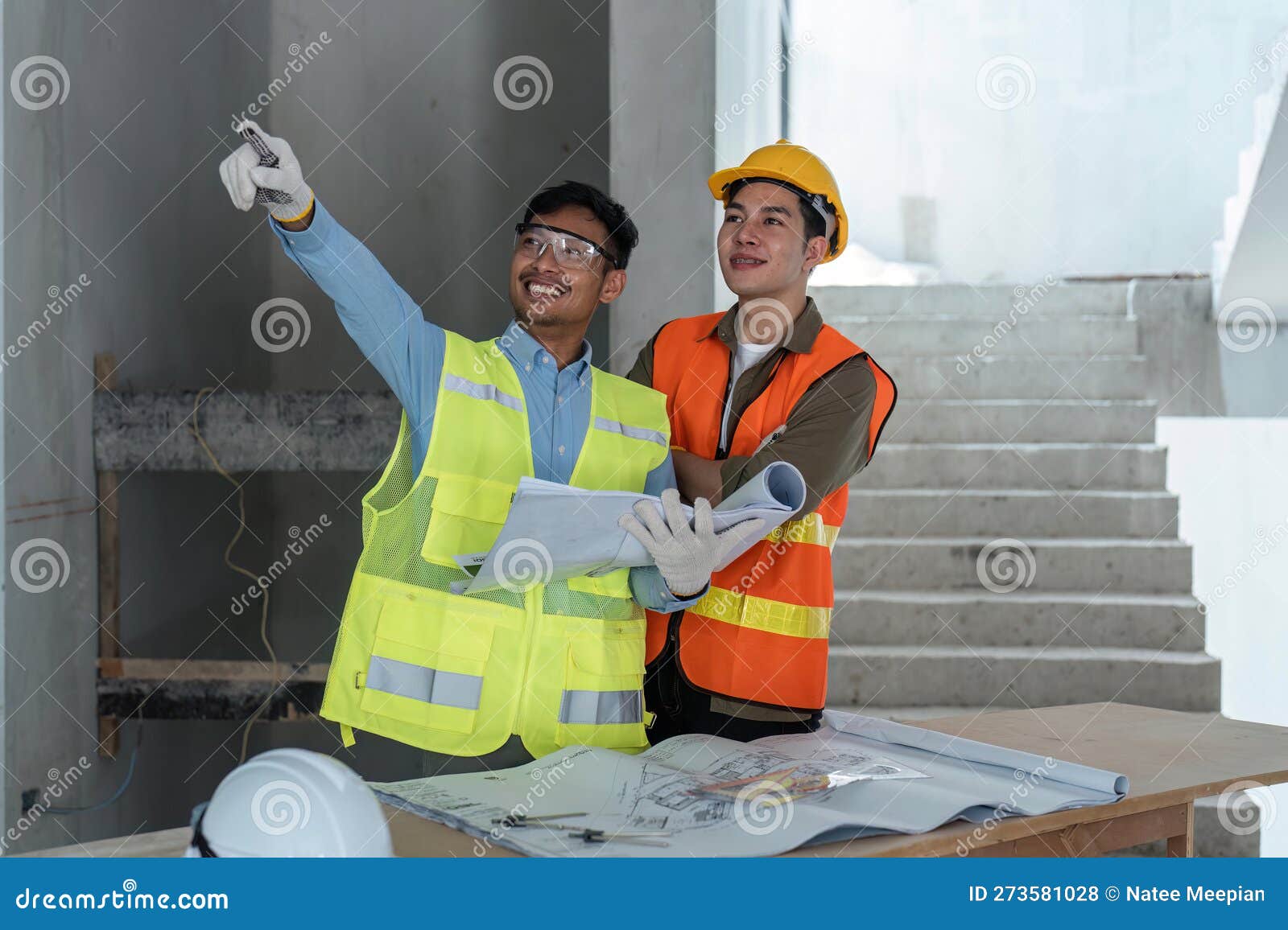 Architect Watching Some Details in Blueprint a Construction Site Stock ...