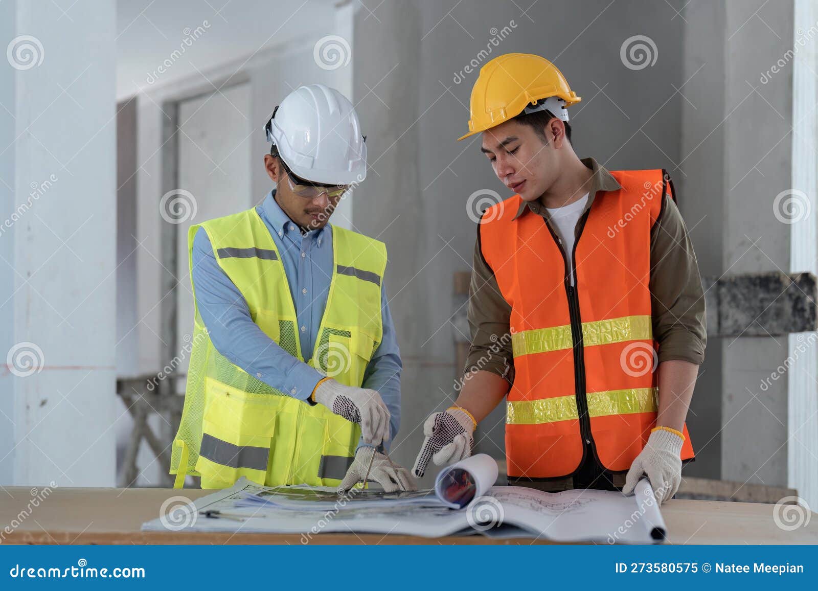 Architect Watching Some Details in Blueprint a Construction Site Stock ...