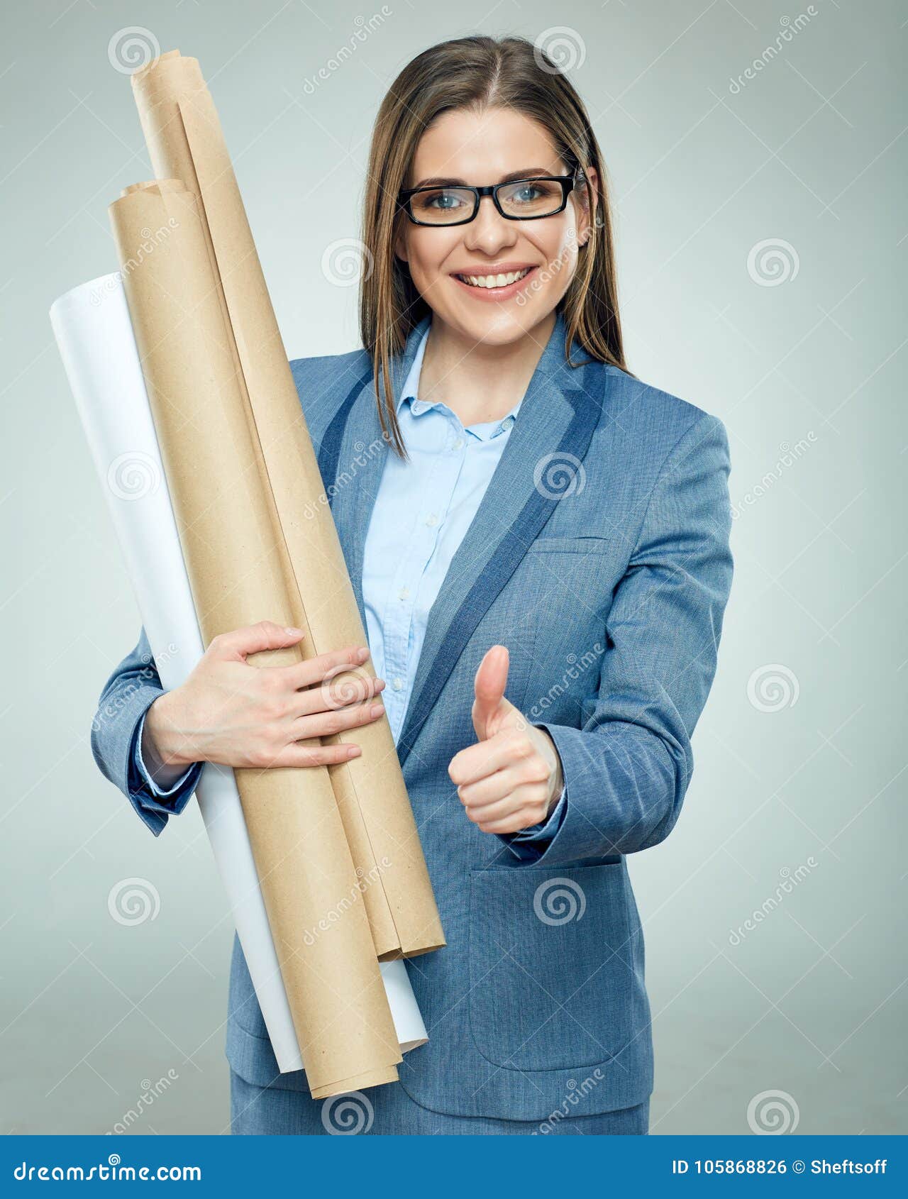 Architect Woman Wearing Glasses Holding Blueprints Shows Thumb U Stock ... Architect Woman Wearing Glasses Holding Blueprints Shows Thumb U Stock ...