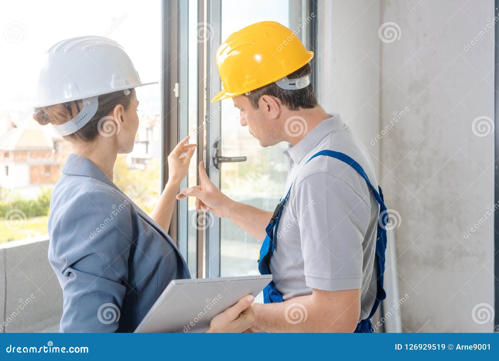Architect and Construction Worker Checking Windows on Site Stock Image ...