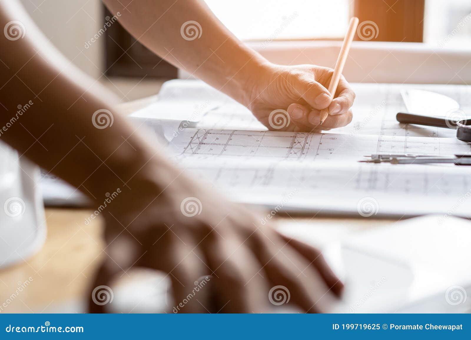 Close Up Hand of Architect Writing on the Blueprints in the Office ...