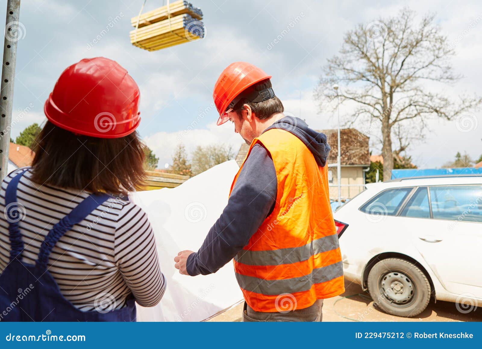 Architect and Worker Watch Crane Unloading Stock Photo - Image of ...