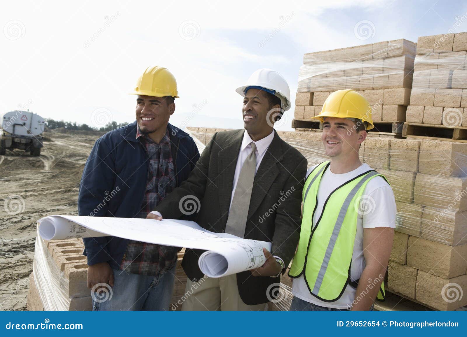 Architect and Workers at Construction Site Stock Photo - Image of ...