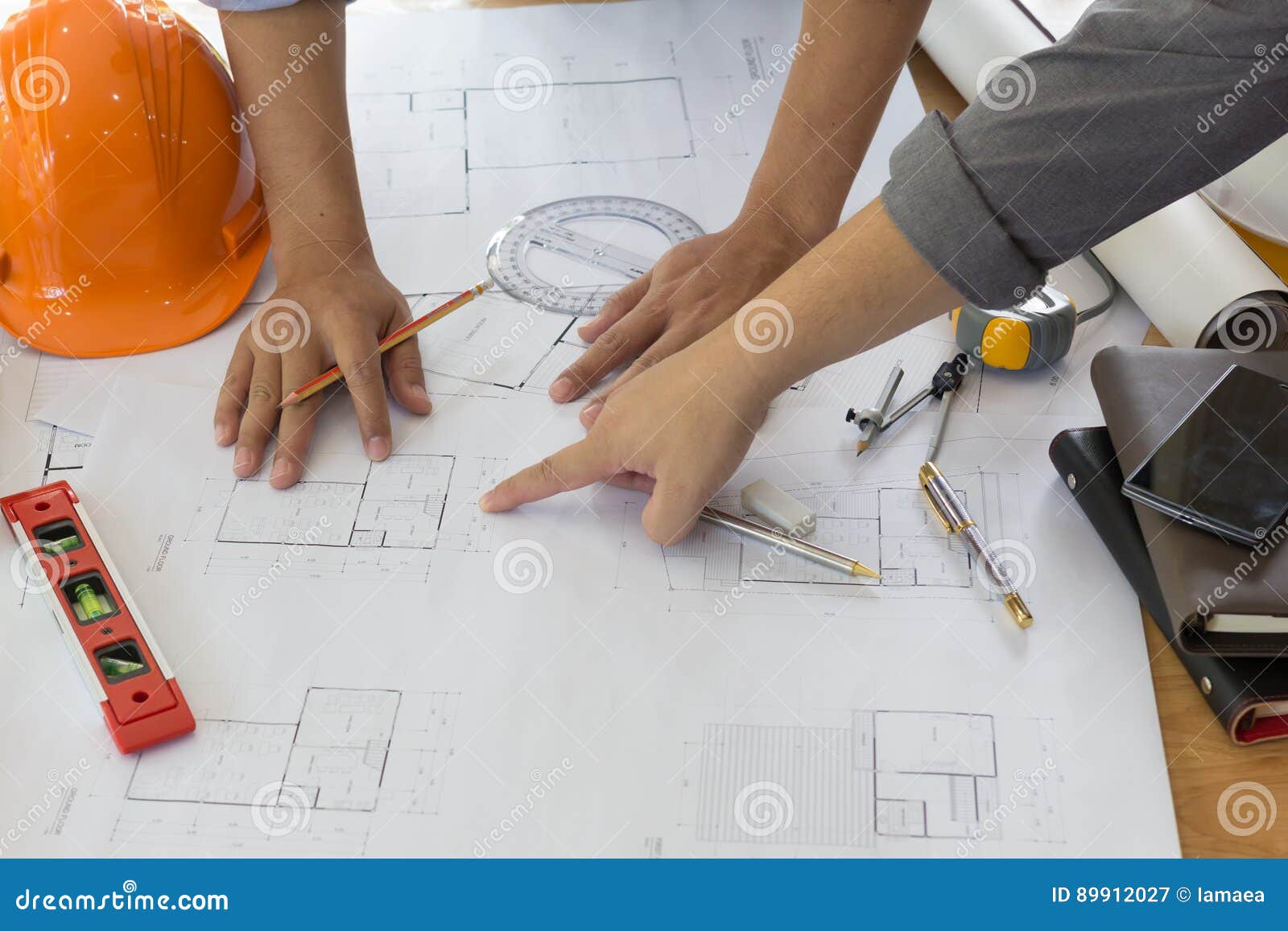 Architect Working on Blueprint. Architects Workplace - Architectural ...