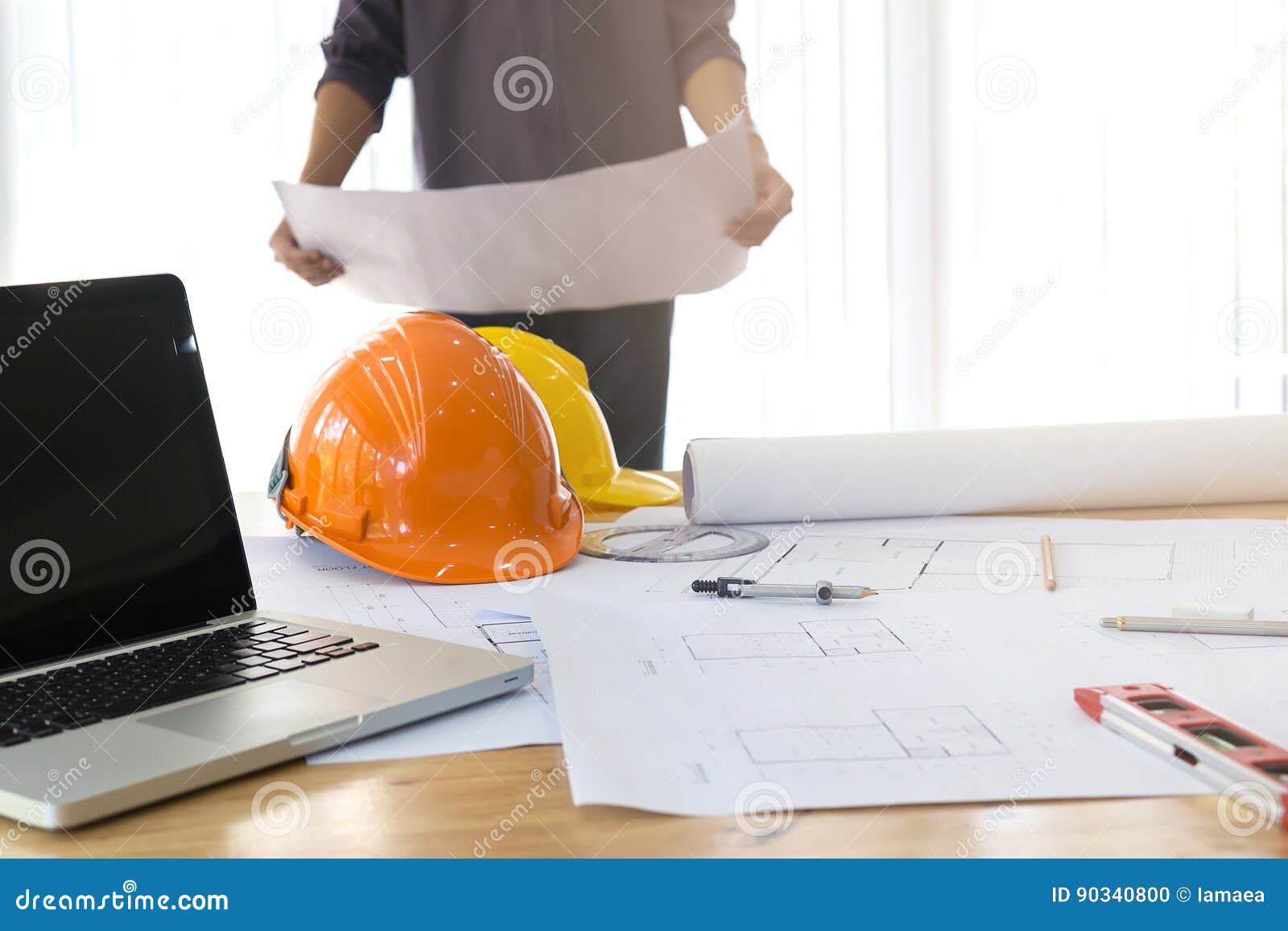 Architect Working on Blueprint. Architects Workplace - Architectural ...