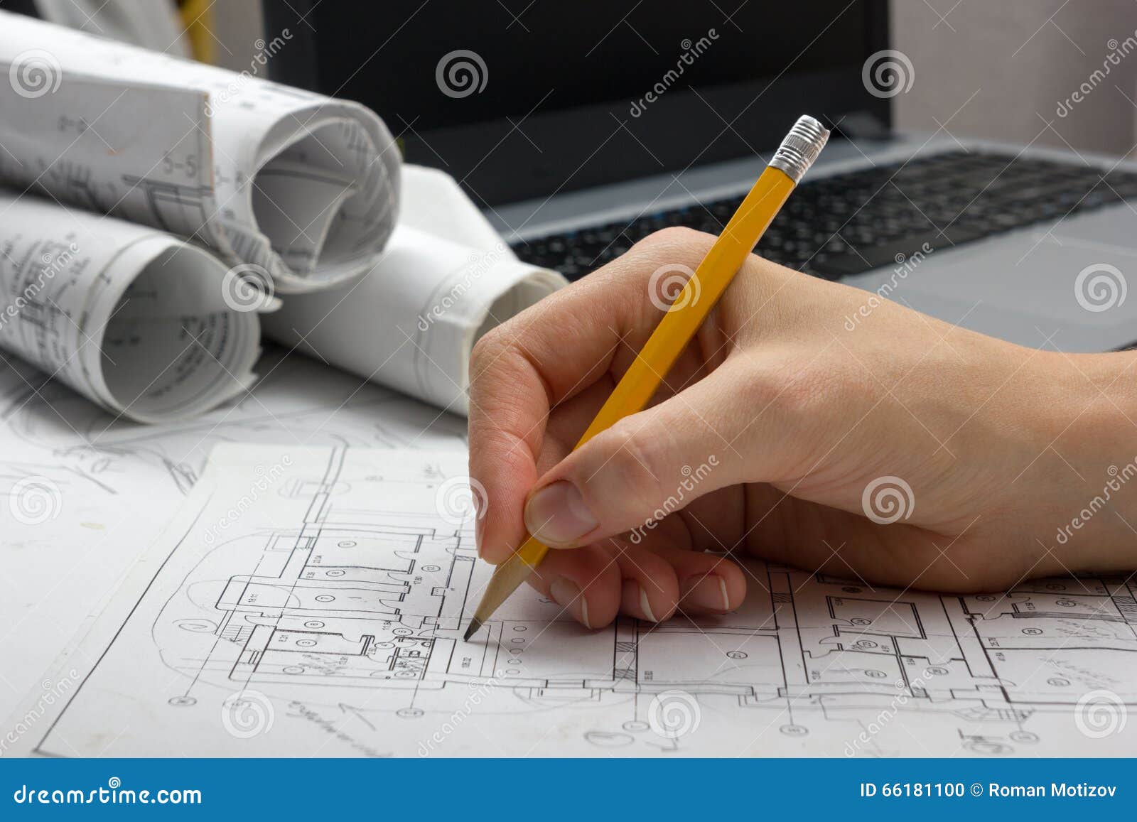 Architect Working On Blueprint. Architects Workplace - Architectural ...