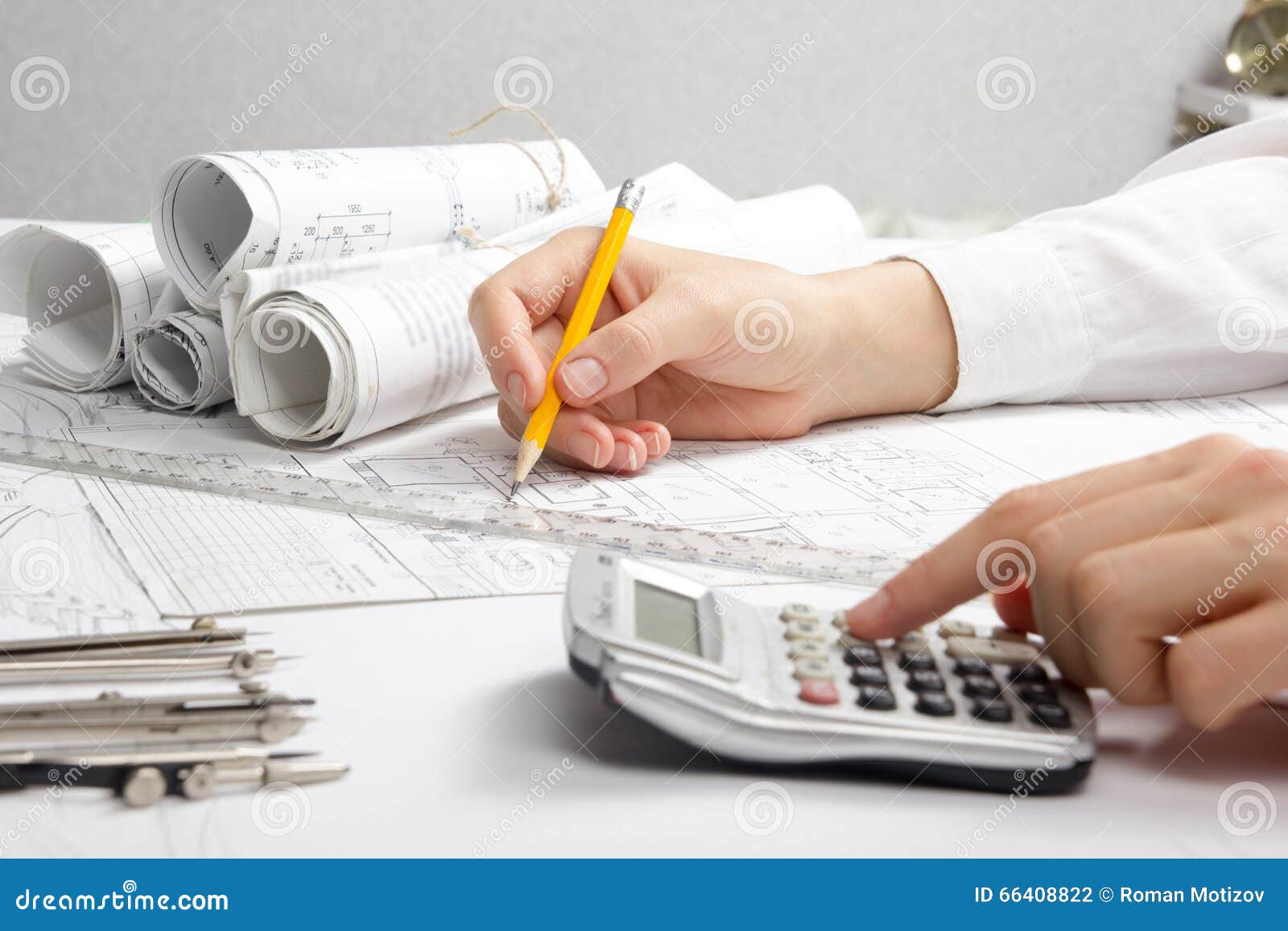 Architect Working On Blueprint. Architects Workplace - Architectural ...