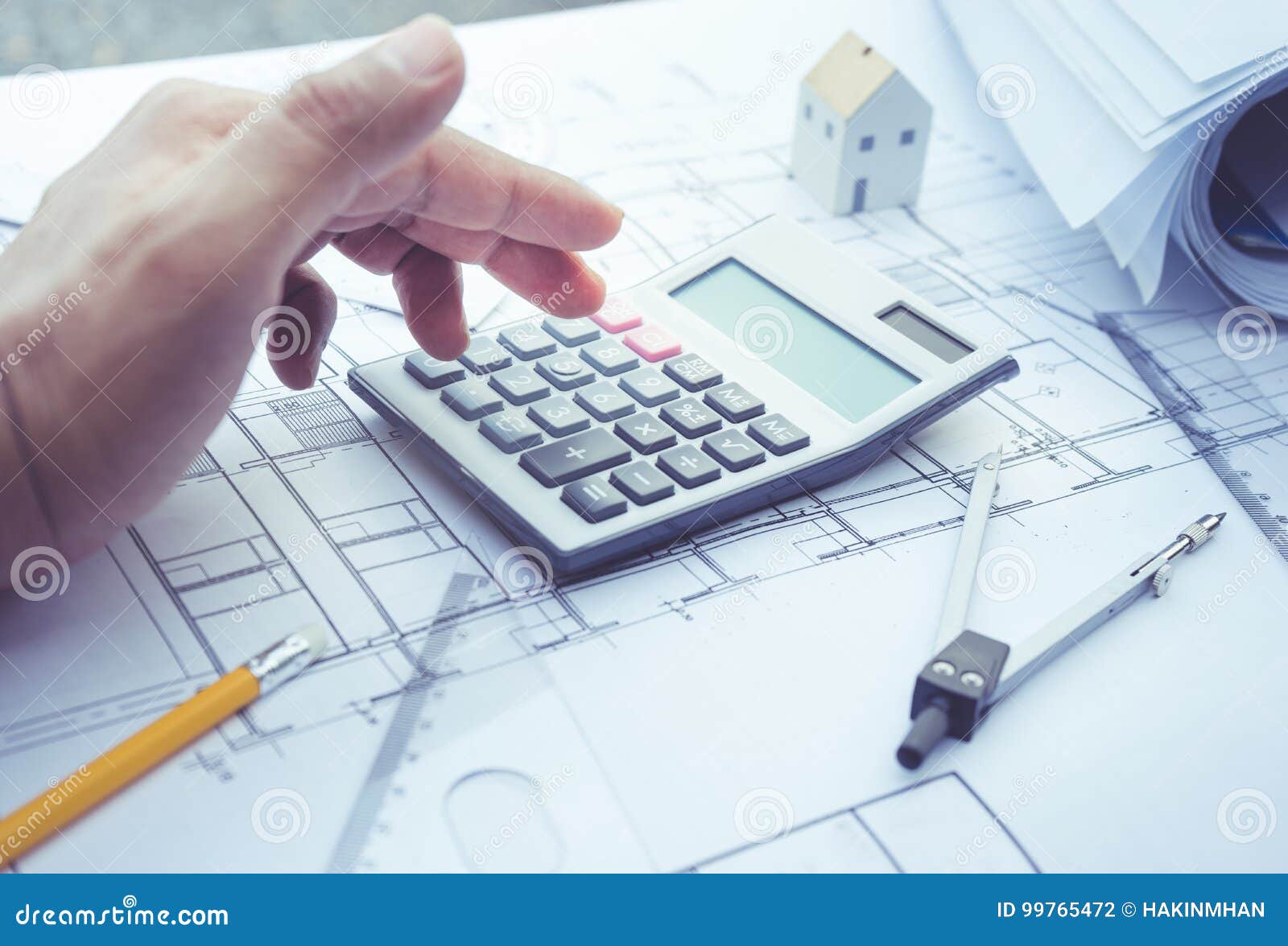 Architect Working With Calculator On Plan Design Paper Stock Photo ...