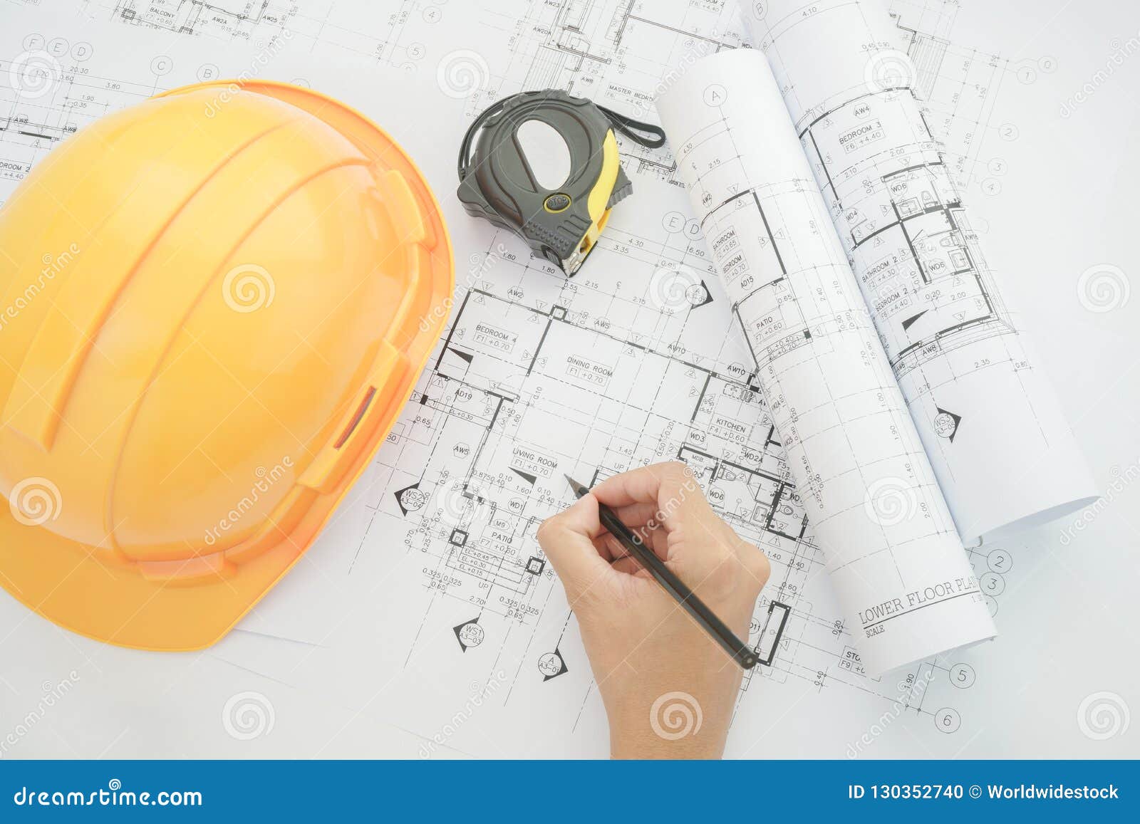 Architect Working on Construction Blueprint. Architects Workplace ...
