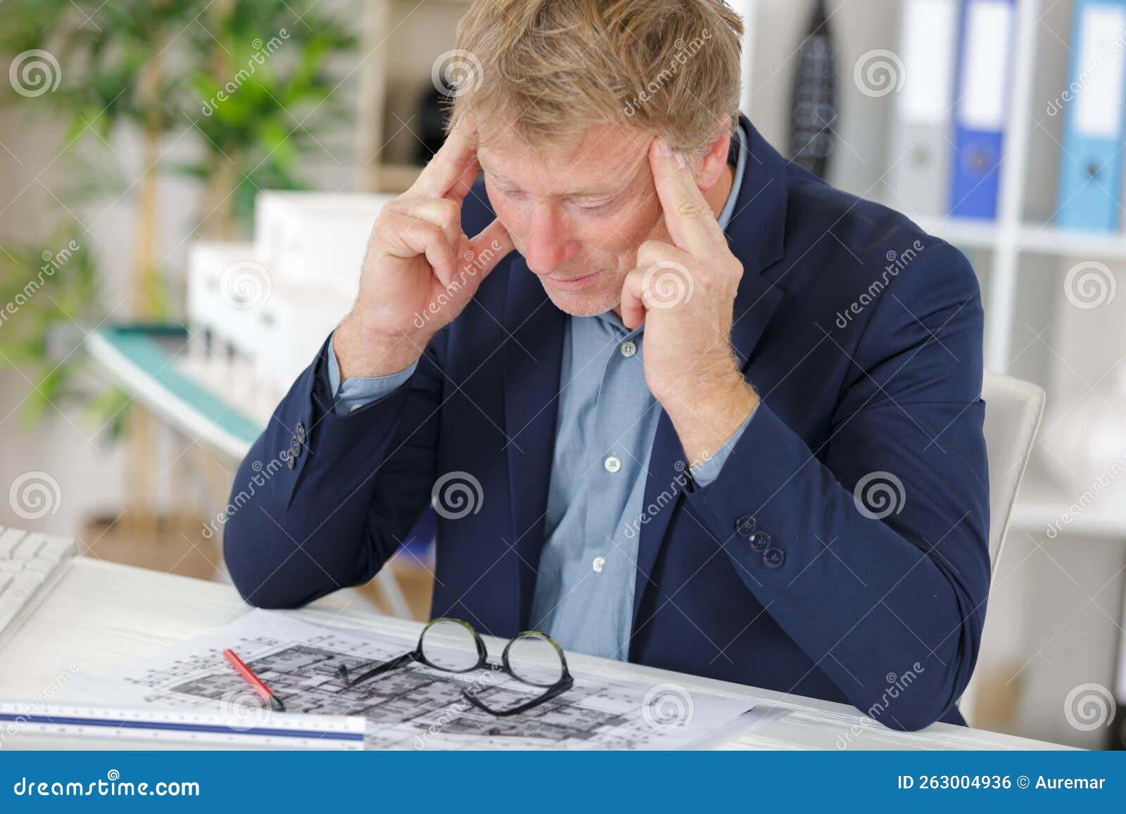 Architect Working on Construction Blueprint in Office Stressed Stock ...