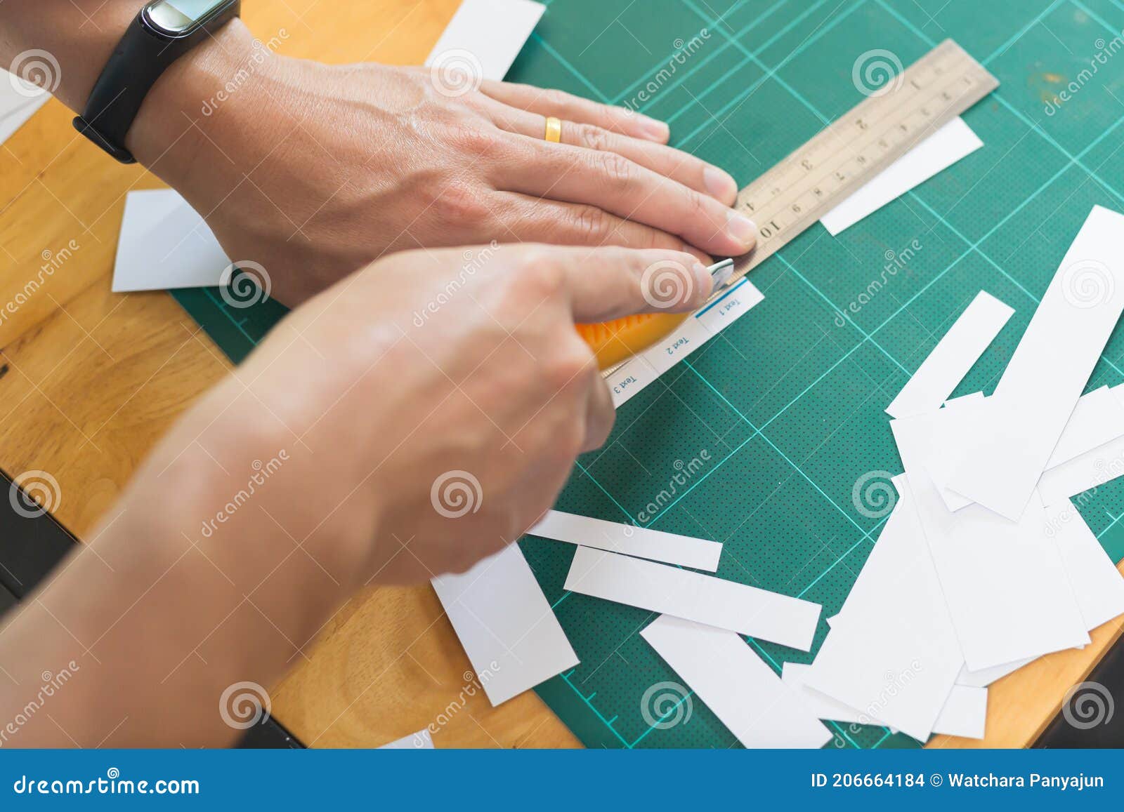 Close Up of Hands Cutting Paper Stock Photo - Image of estate, measure ...