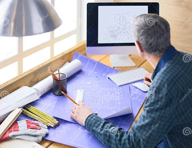 Architect Working on Drawing Table in Office Stock Photo - Image of ...