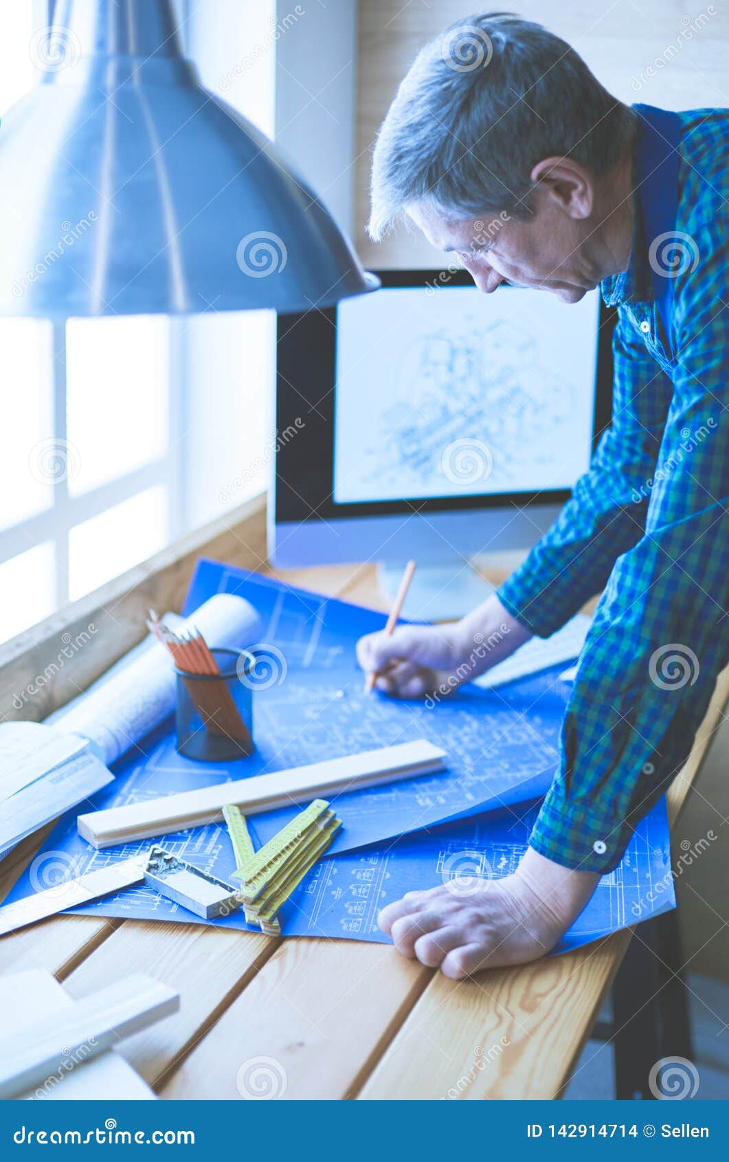 Architect Working on Drawing Table in Office Stock Photo - Image of ...