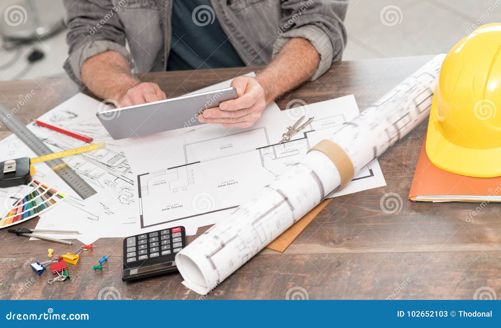 Architect working on plans stock image. Image of professional - 102652103