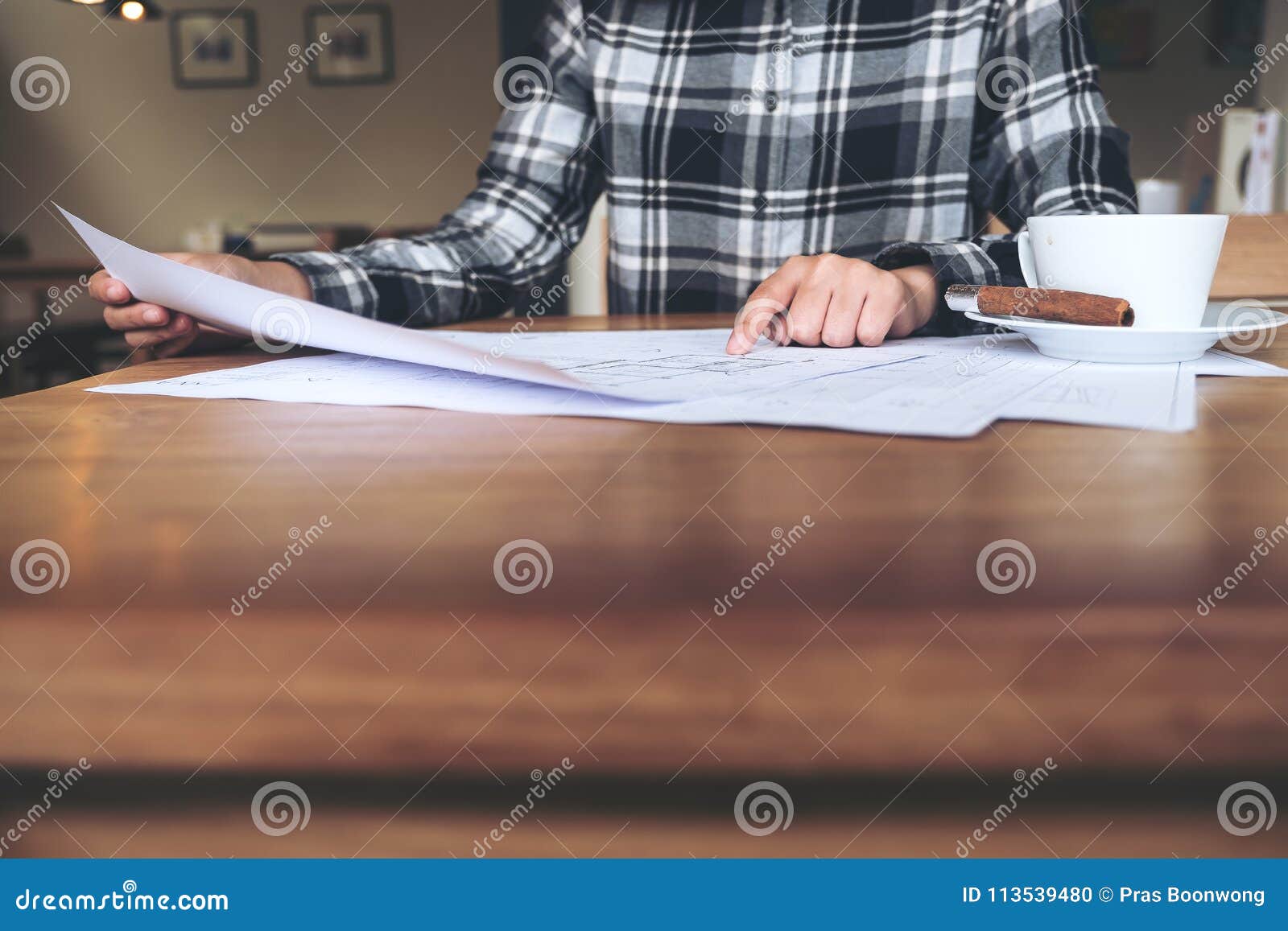 Architect Working and Pointing at Shop Drawing Paper on Table Stock ...