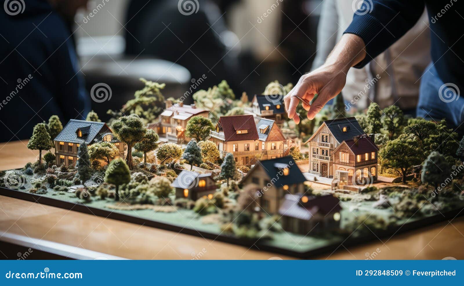 Architect Working on a Small Scale Model of a Housing Development ...