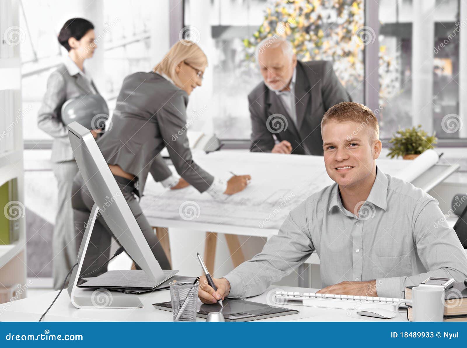 Architects busy at work stock image. Image of businesspeople - 18489933