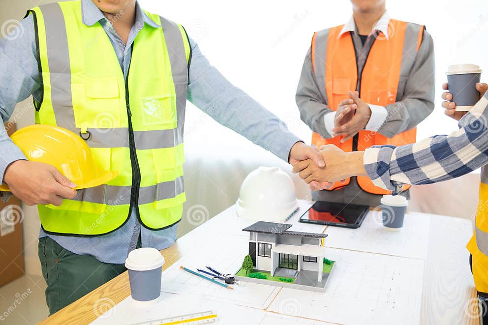 Architects and Construction Engineering Handshake after Meeting Discuss ...