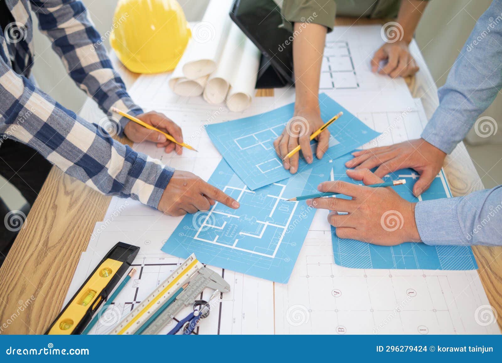 Architects and Construction Engineers Meet To Discuss Blueprints of ...