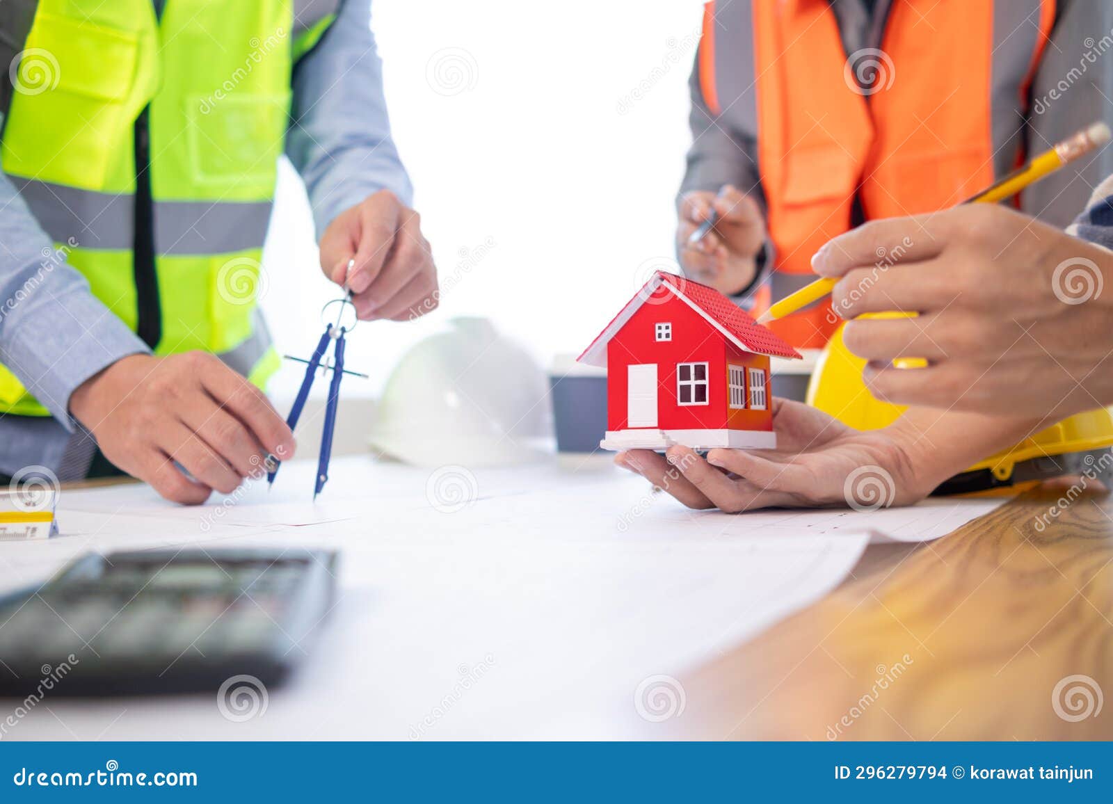 Architects and Construction Engineers Meet To Discuss Blueprints of ...