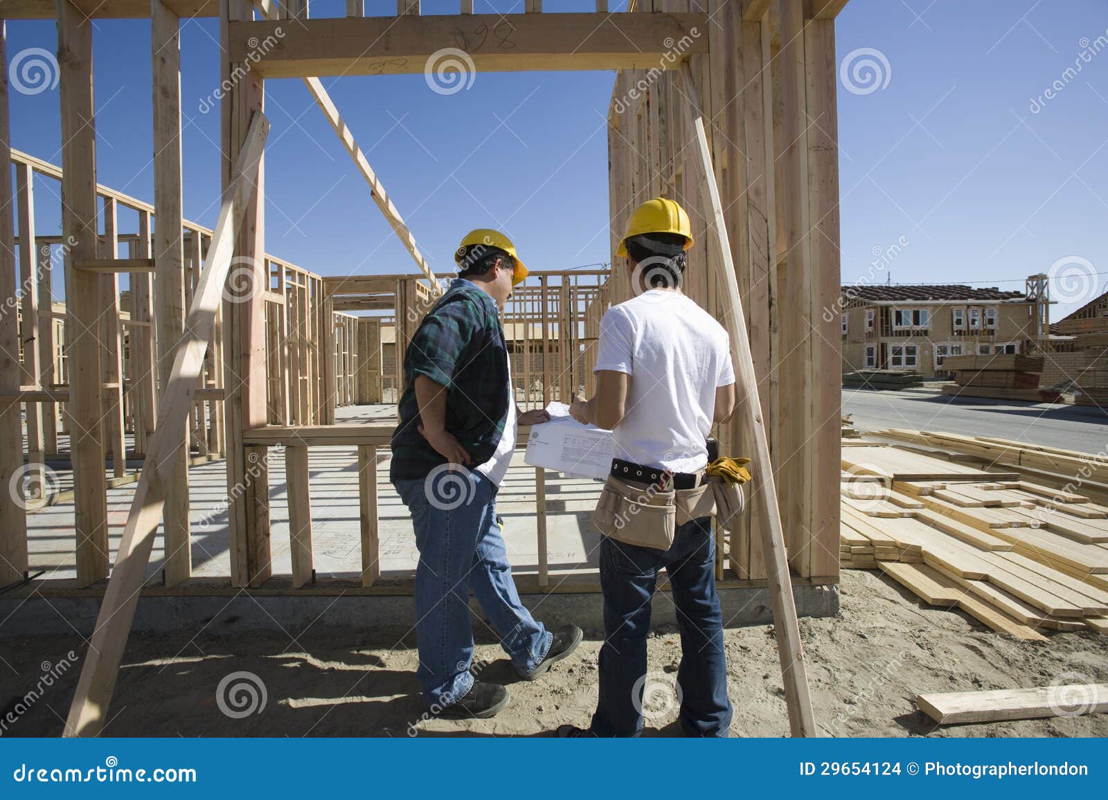 Architects at Construction Site Stock Photo - Image of framework, adult ...