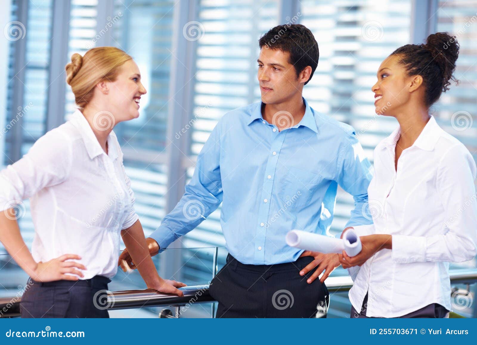 Architects Conversing with Blueprints. Portrait of Multi Racial ...