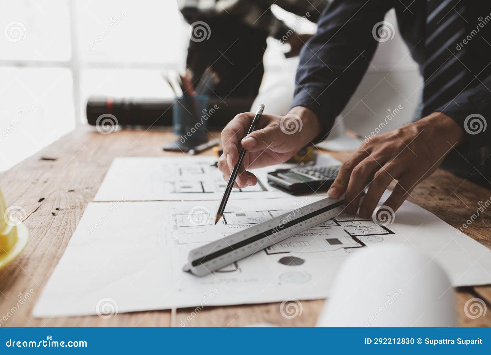 Architects Design Team Is Looking At Models Of Small Houses, Architect ...