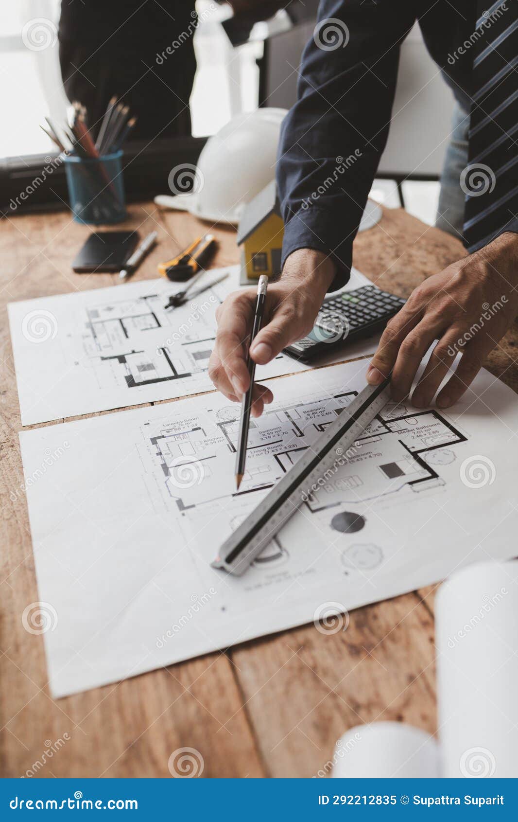 Architects Design Team Is Looking At Models Of Small Houses, Architect ...