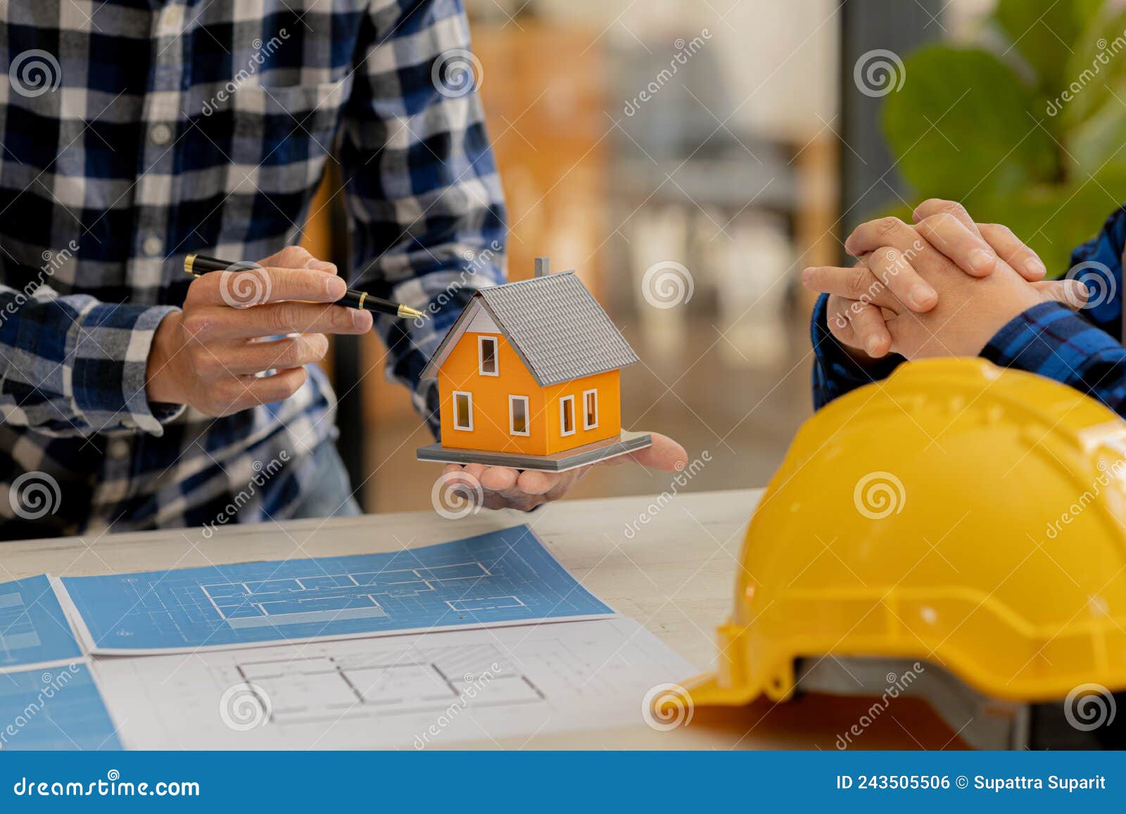 Architects Design Team is Looking at Models of Small Houses, Architect ...