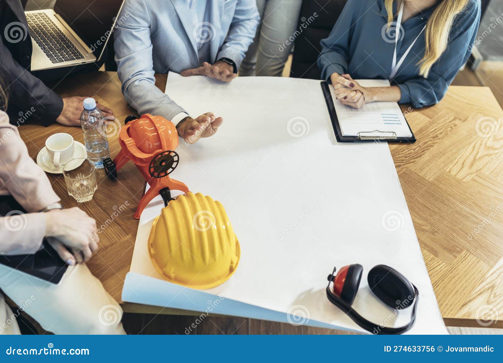 Architects, Designers and Engineers Working on Project Together in ...