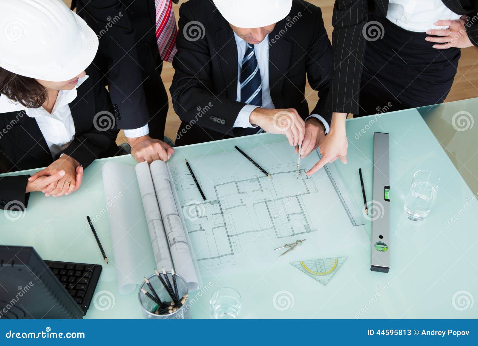 Architects Discussing a Blueprint Stock Image - Image of hardhat ...