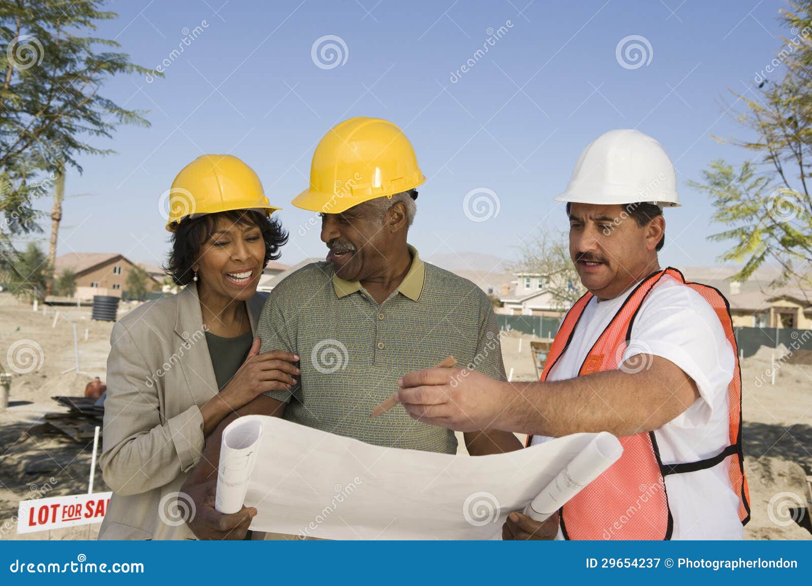 Architects Discussing at Construction Site Stock Image - Image of ...