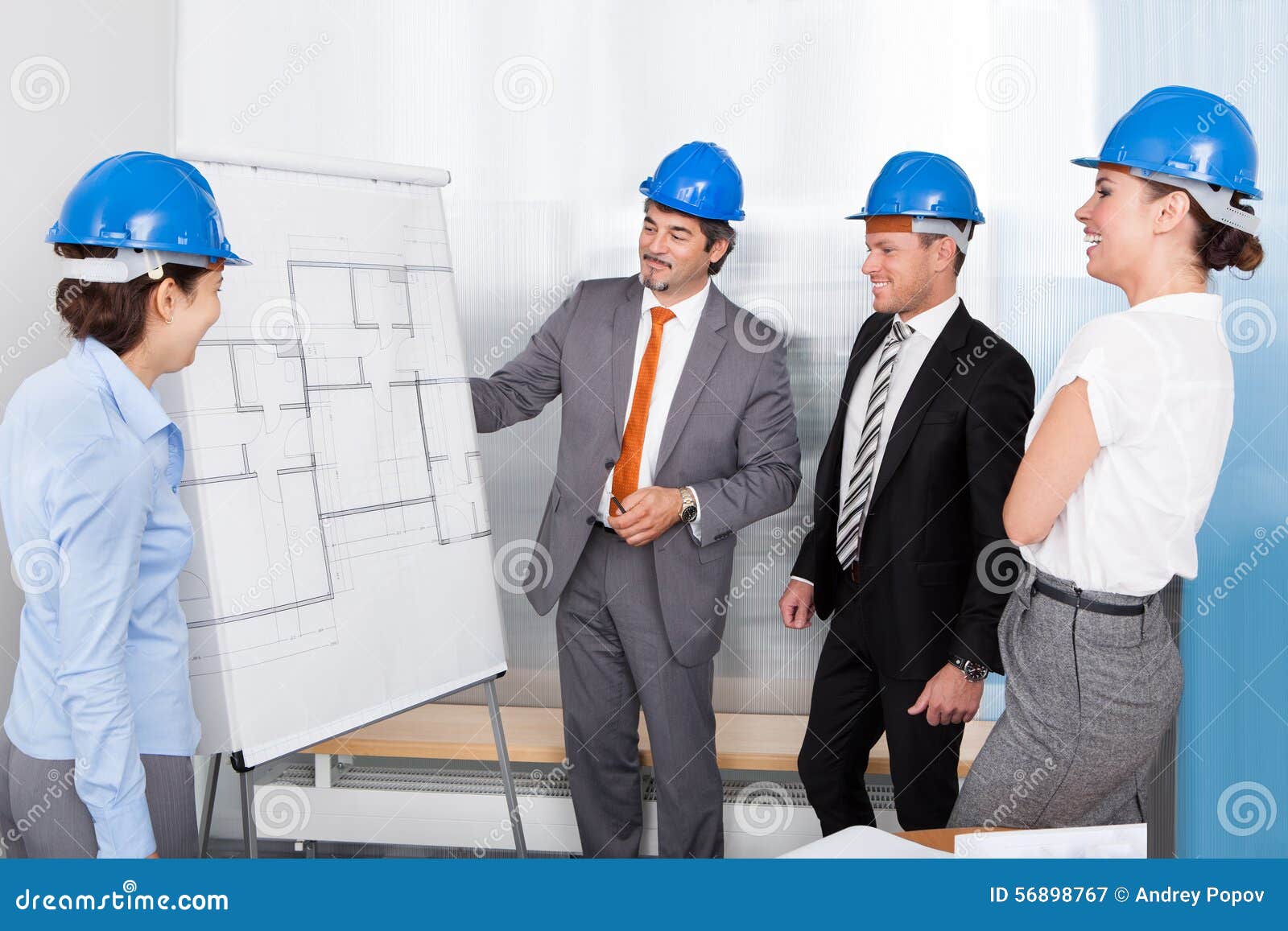 Architects Discussing Plan stock image. Image of office - 56898767
