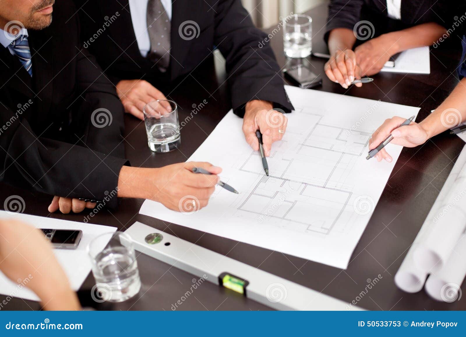 Architects Discussing at the Table with Blueprint Stock Image - Image ...