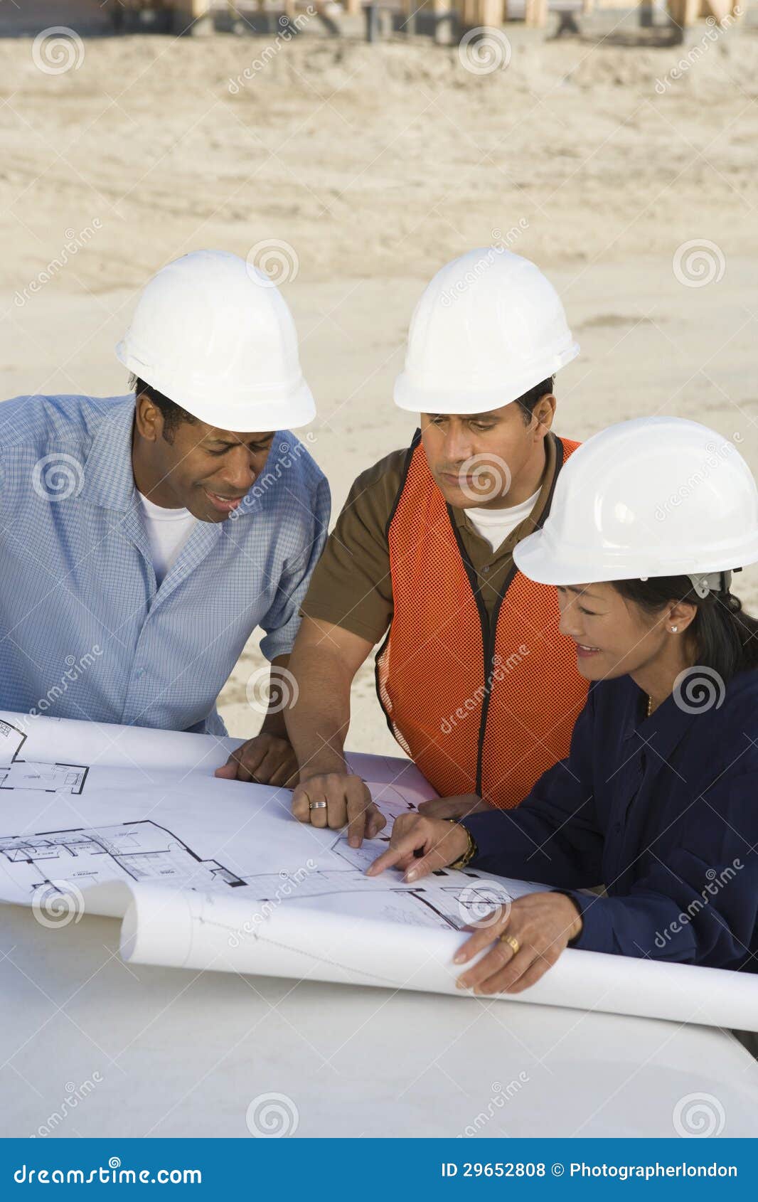 Architects in Discussion with Blueprint Stock Photo - Image of ...