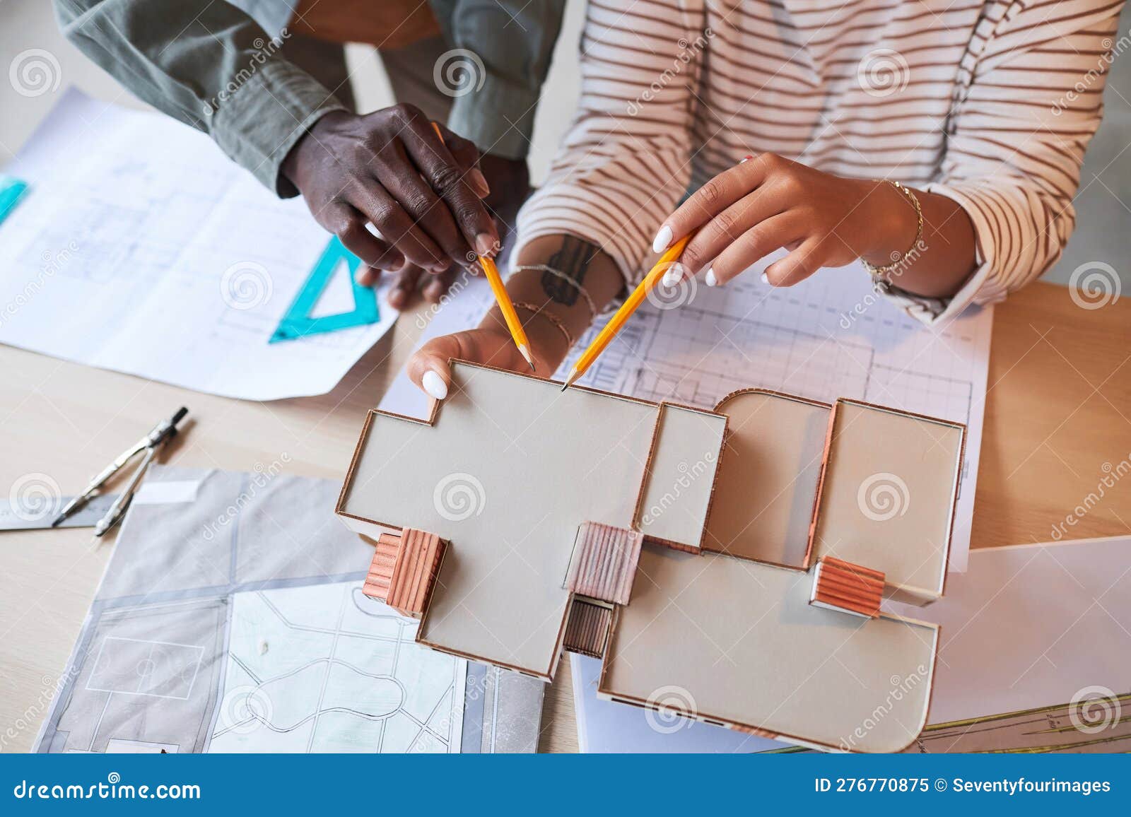 Architects Drawing Model of Building in Team Stock Image - Image of ...