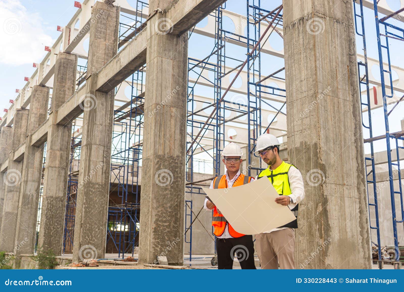 Architects Engineer are Checking the Progress of the Building Project ...