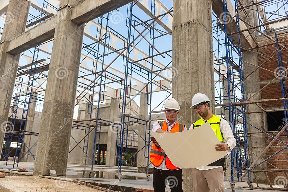 Architects Engineer are Checking the Progress of the Building Project and Checking the Accuracy ...