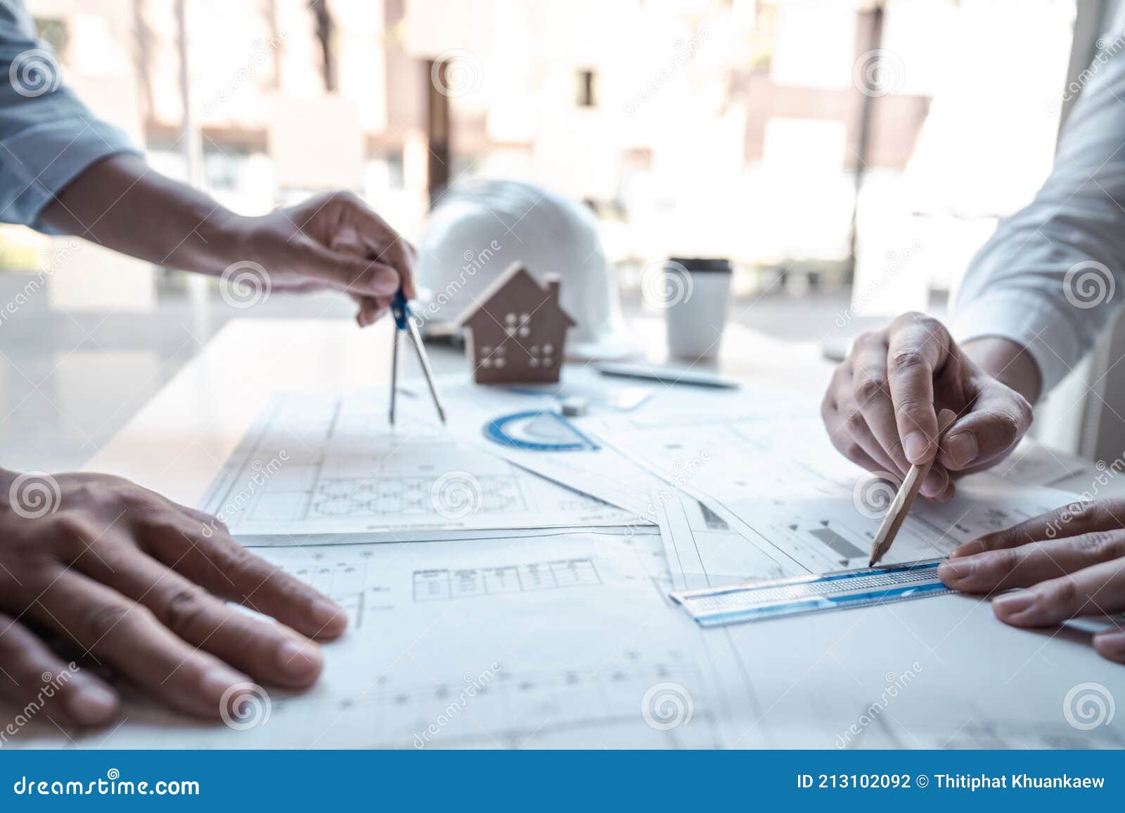 Architects or Engineering Team Consulting and Analyzing Working on ...