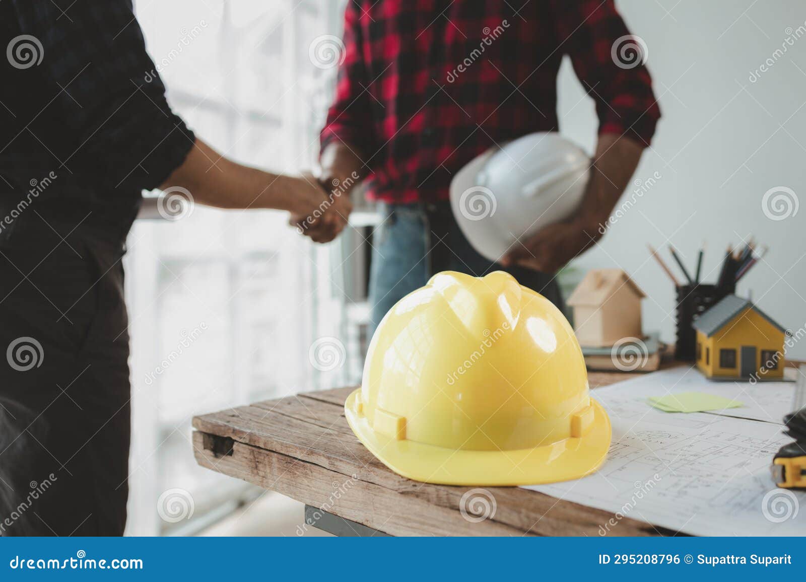 Architects and Engineers Agree on Blueprints Together, an Agreement is ...