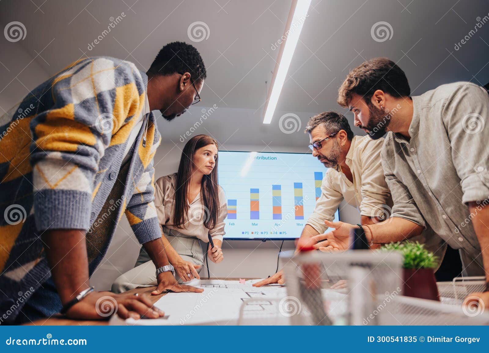 Diverse Multinational Team Collaborates Creatively, Supporting Each ...